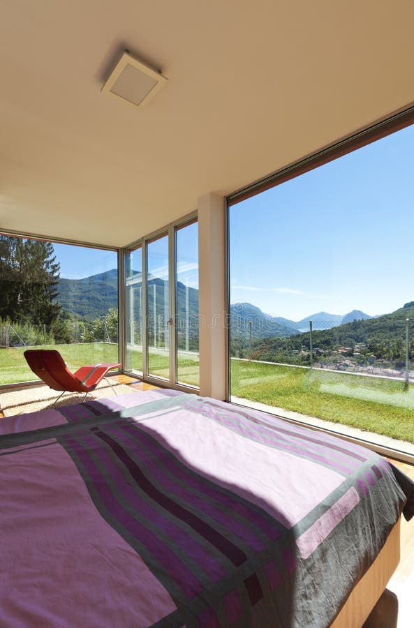 View of a bed in a bedroom stock image. Image of luxury - 15232117