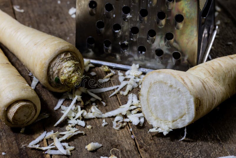 Root of Parsley Root on Grater. Grate and Parsley on the Old Kit Stock ...