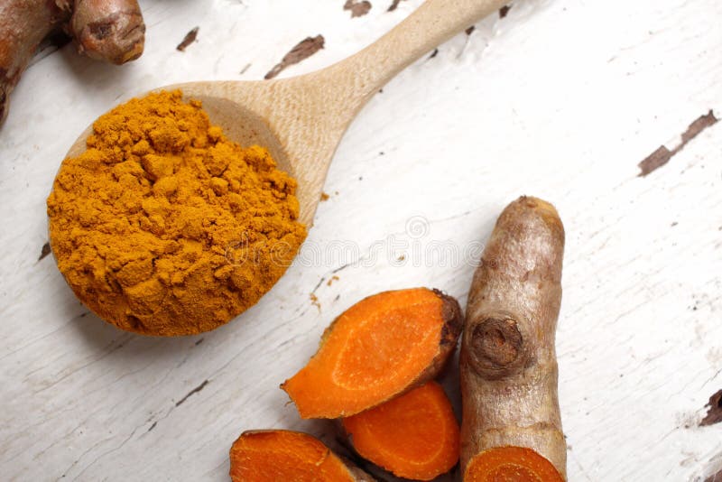 Roots and powder turmeric stock image. Image of herb - 73729747