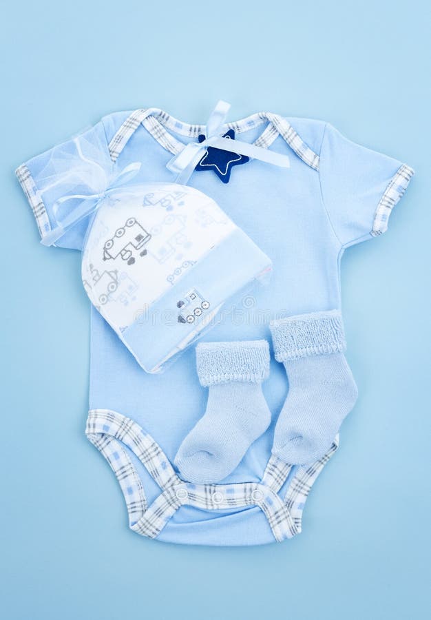 Ropa Del Bebé Azul Para El Muchacho Infantil Foto de archivo - Imagen ...