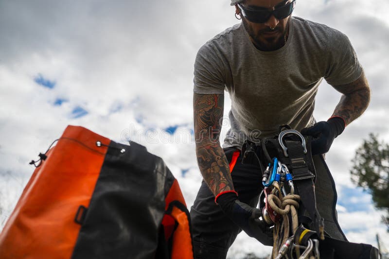 Rope Access Technician Preparing Equipment for Tree Pruning Stock Image ...