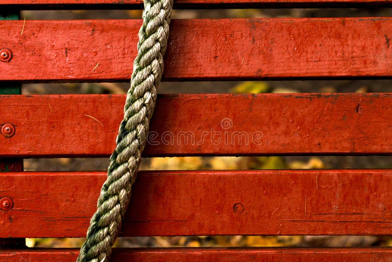 Rope on a Background of Red Boards. Stock Image - Image of deserted ...