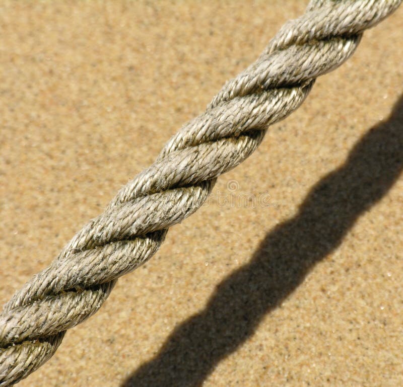 Rope on the beach stock image. Image of closeup, shade - 233853