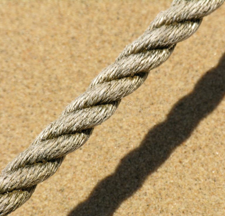 Rope on the beach stock image. Image of closeup, shade - 233853