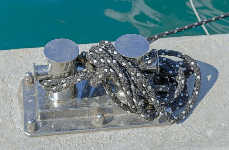 Rope and bollard stock image. Image of iron, ocean, line - 144744759