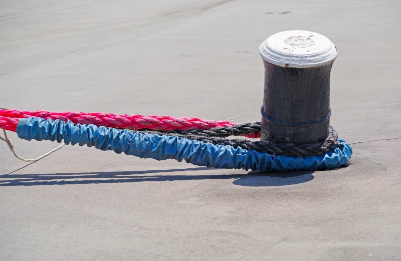Rope and bollard stock image. Image of transportation - 153048153