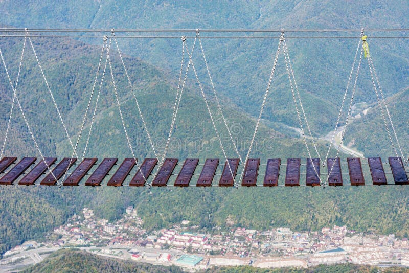 Rope Bridge Above the Deep Gorge. Caucasus Stock Photo - Image of gorge ...