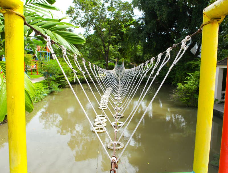 Rope bridge stock image. Image of pedestrian, palm, rope - 32840631