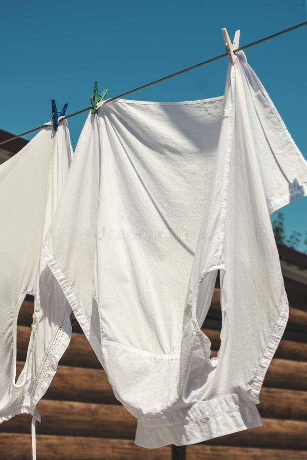 White Clean Clothes on the Rope Outdoors Stock Image - Image of hold ...