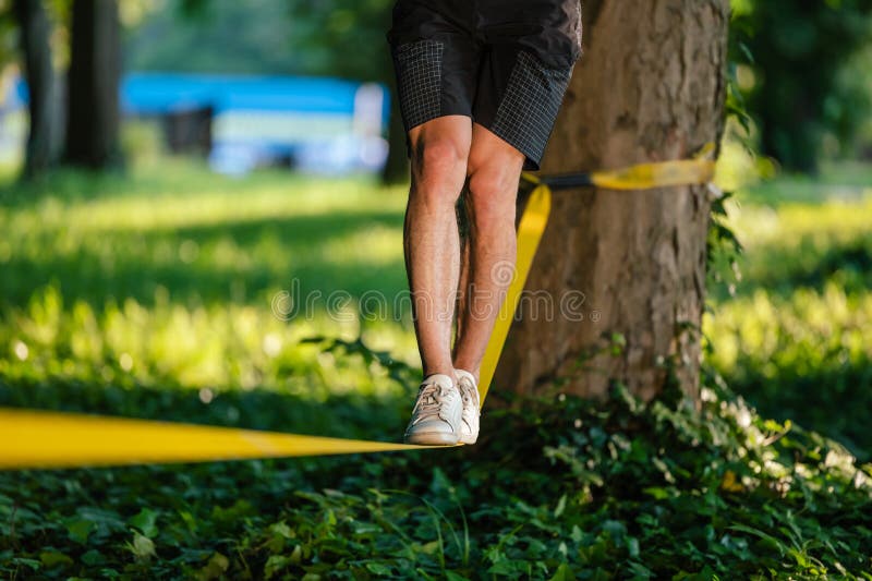 Close Up Picture of Mans Legs Walking on the Rope Stock Photo - Image ...