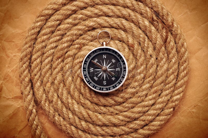 Rope coil with compass stock photo. Image of north, exploration - 17938794