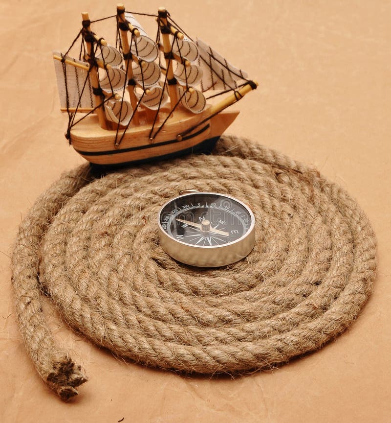 Rope coil with compass stock photo. Image of rope, aged - 17938818