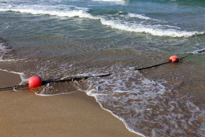 Rope with Floats on the Seashore Stock Image - Image of seashore, beach ...