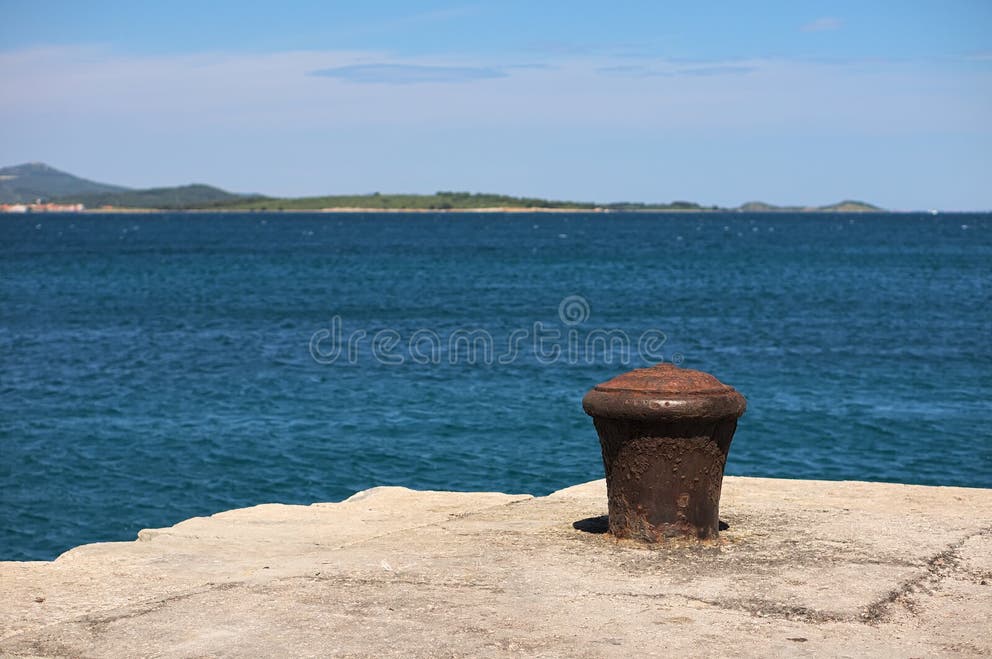 Rope holder on coast stock photo. Image of travel, yachting - 54799792