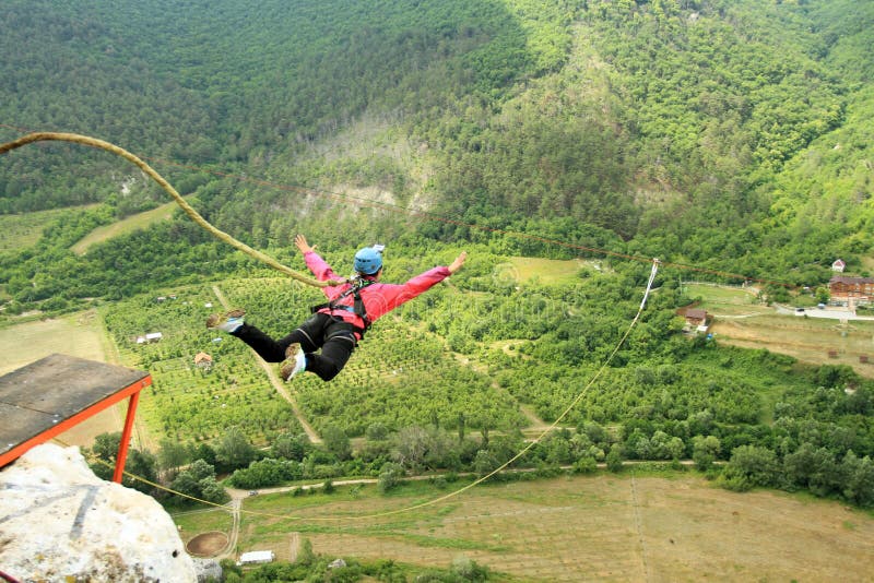 Rope Jumping.Bungee Jumping. Stock Photo - Image of adrenaline, diving ...