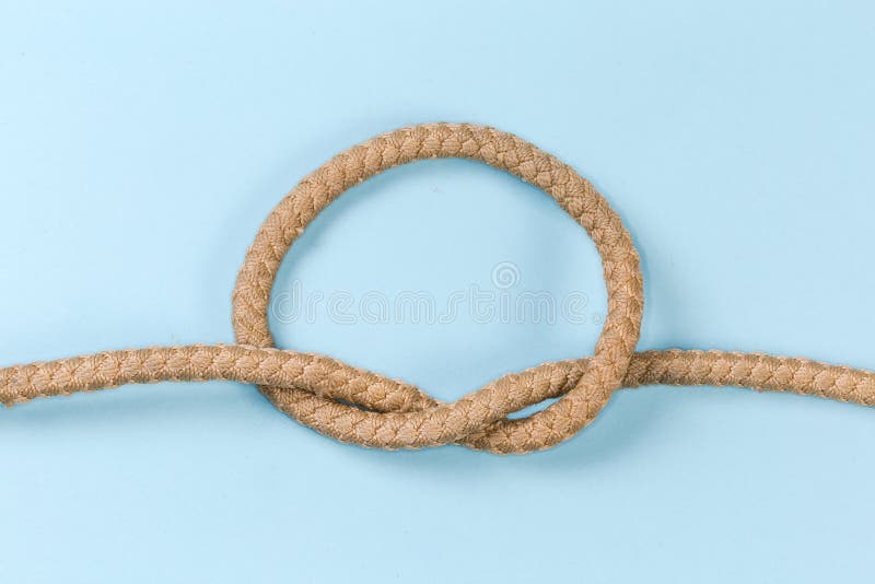 Rope Knot Overhand Loop on Blue Background Close-up Stock Image - Image ...