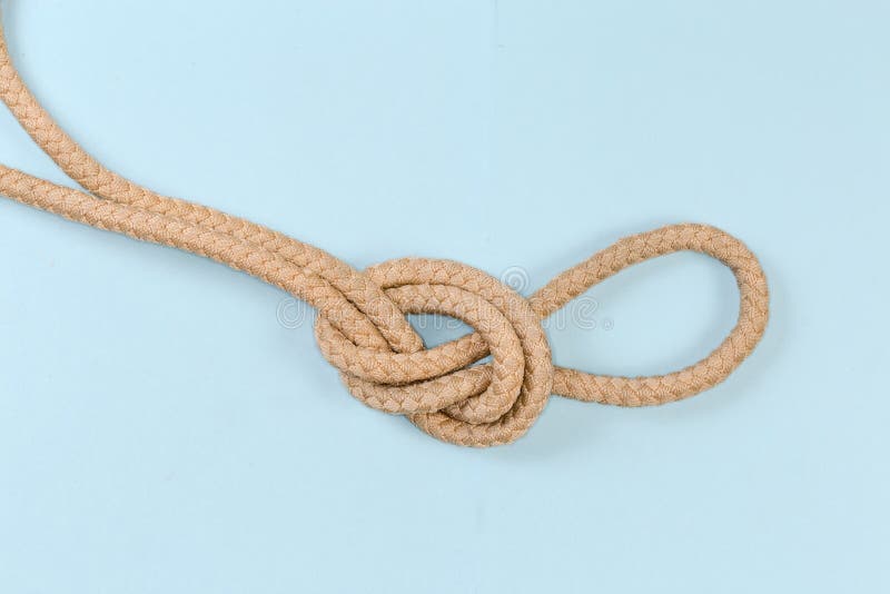 Rope Knot Overhand Loop on Blue Background Close-up Stock Image - Image ...