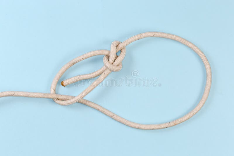 Rope Knot Running Bowline on a Blue Background Stock Photo - Image of ...