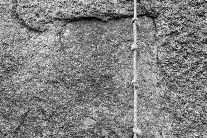 Rope with Knots on a Rock Horizontal Stock Photo - Image of rope ...