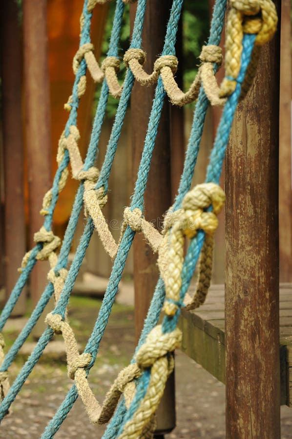 Boy Climbing a Rope Ladder in Playground Stock Image - Image of funpark ...