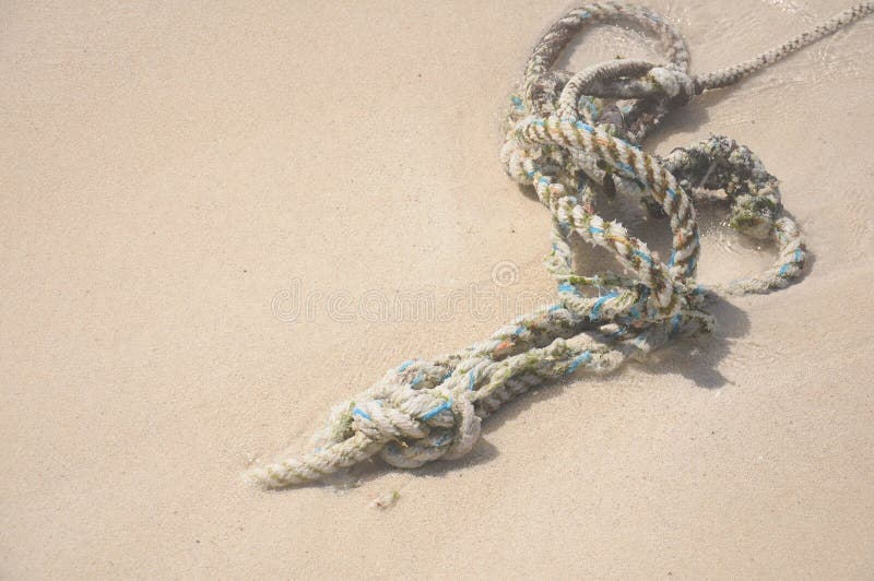 A Rope is Laying on the Sand Stock Image - Image of aruba, ocean: 315957643