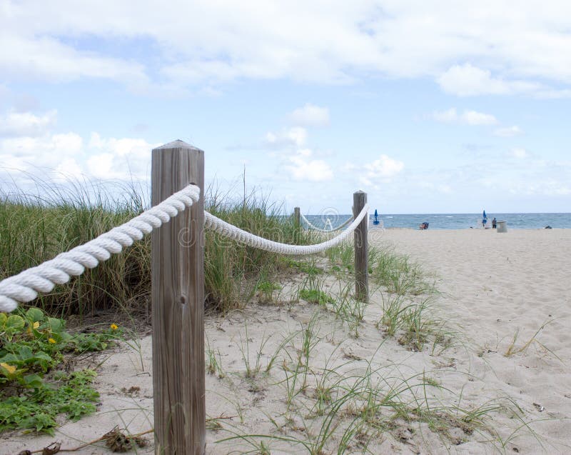 Rope leading to the beach stock image. Image of ocean - 84976511