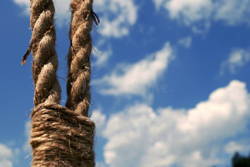 A Rope Loop with a Knot Against a Blue, Overcast Sky Stock Photo ...