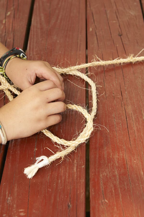 Rope making at camp stock image. Image of cable, hands - 234029161