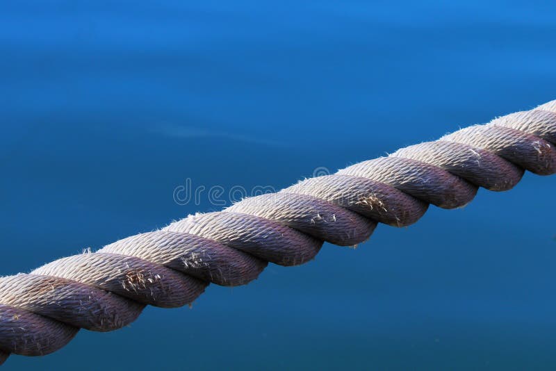 Rope for Mooring a Ship in the Port Close-u Stock Image - Image of ...