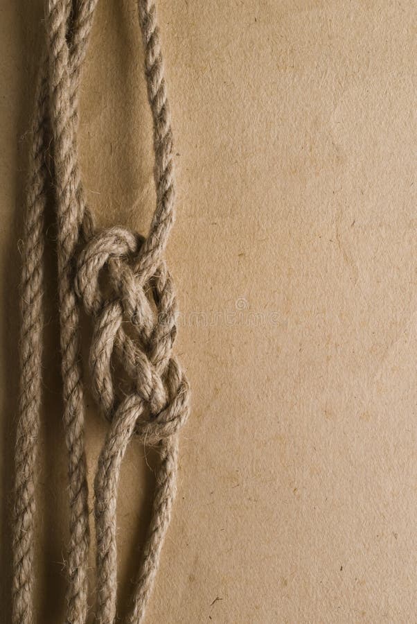 Aged Rope on the Old Paper Background Stock Photo - Image of scroll ...