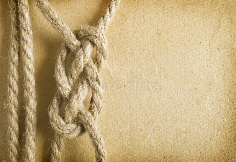 Aged Rope on the Old Paper Background Stock Photo - Image of scroll ...