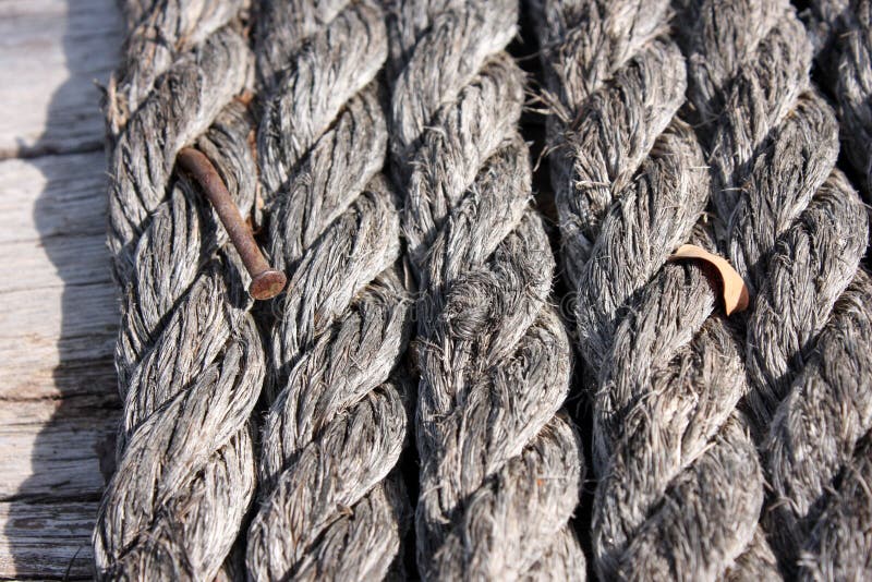 Rope and Old Rusty Nail for Background Stock Image - Image of hawser ...
