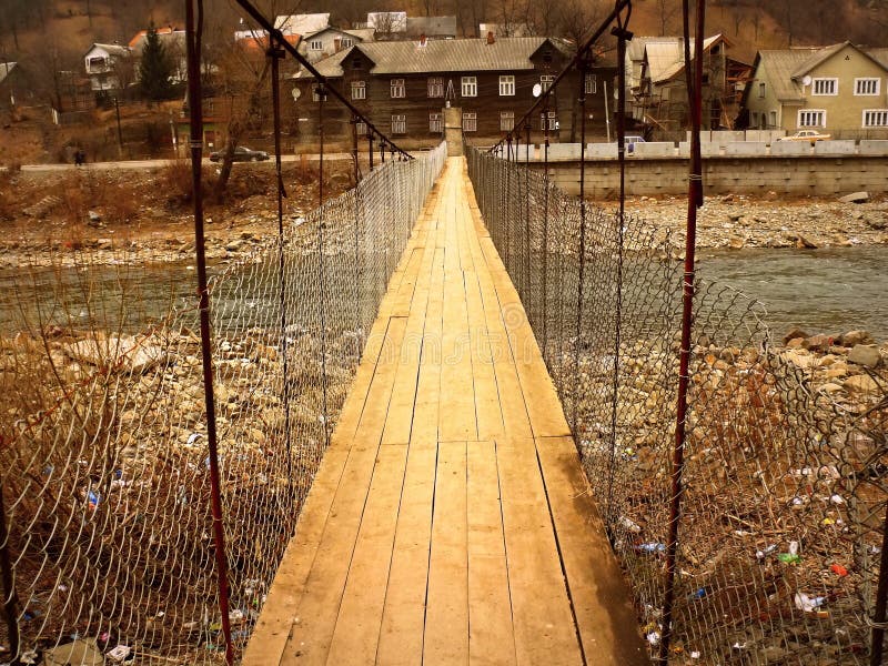 Rope Pedestrian Bridge in the Town Stock Photo - Image of cloudy, town ...