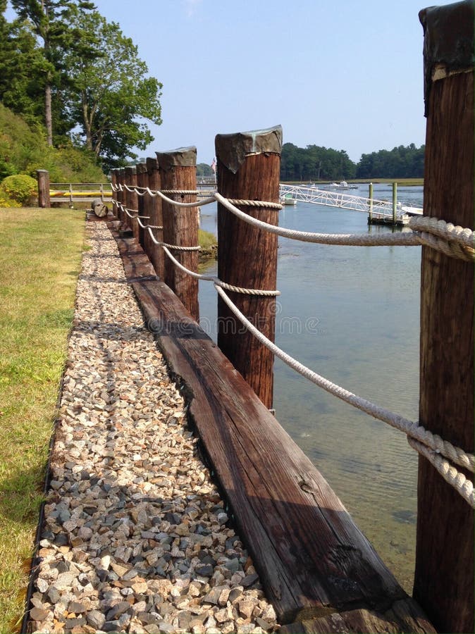 Rope and posts stock image. Image of rope, trees, grass - 106519835