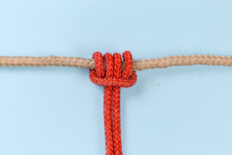 Rope Prusik Knot on a Blue Background Stock Photo - Image of secure ...