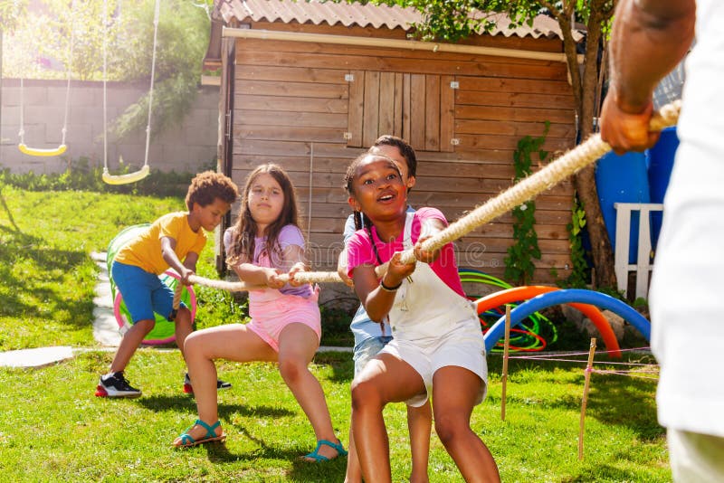 Rope Pulling Action Game Kids in Diverse Group Stock Image - Image of ...