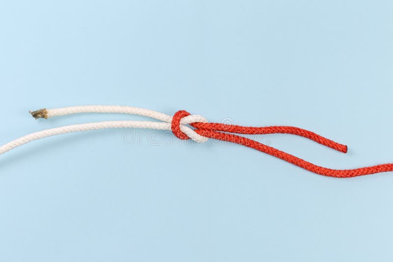 Rope Reef Knot on a Blue Background Stock Image - Image of everyday ...