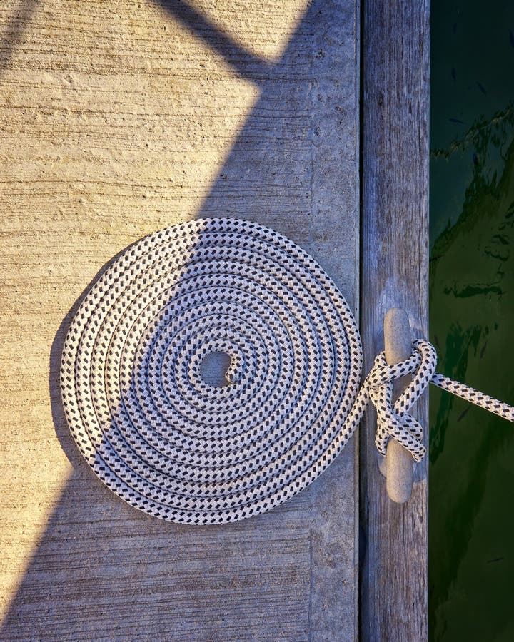 Rope Snail with Sun and Shadow on Pier on the Baltic Sea Stock Photo ...