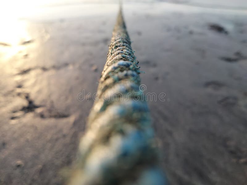 A Rope Stretched Across the Beach Stock Photo - Image of sand, beach ...