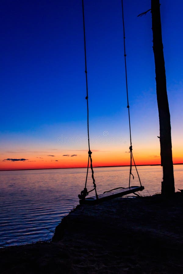 Rope Swing on Shore of the Dnieper River in Ukraine at Sunset Stock ...