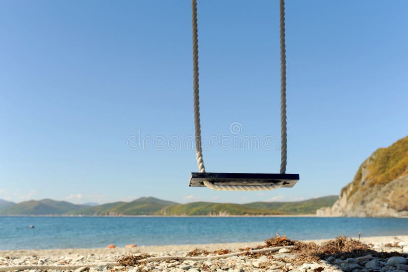 Rope Swing on the Shore of the Gorgeous Azure Sea, Sandy Beach and ...