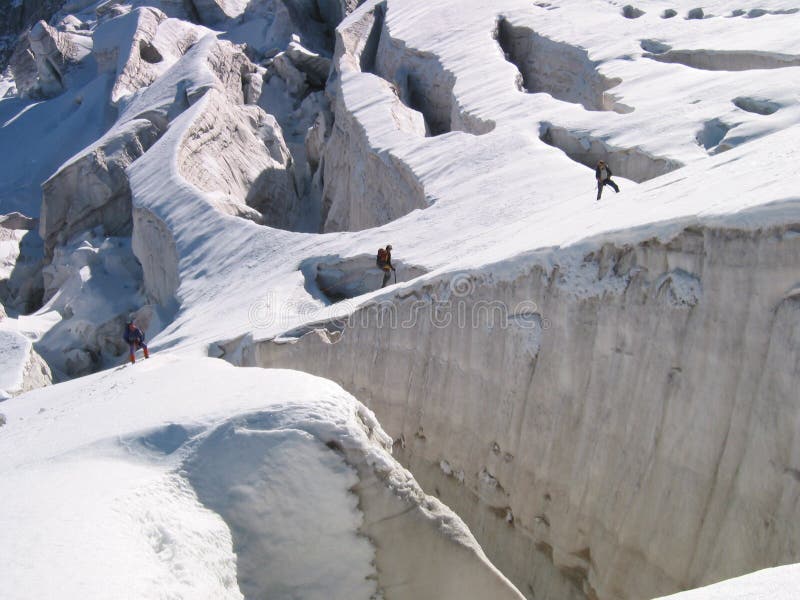 Rope Team in Front of Glacier Crevasses Stock Photo - Image of snow ...
