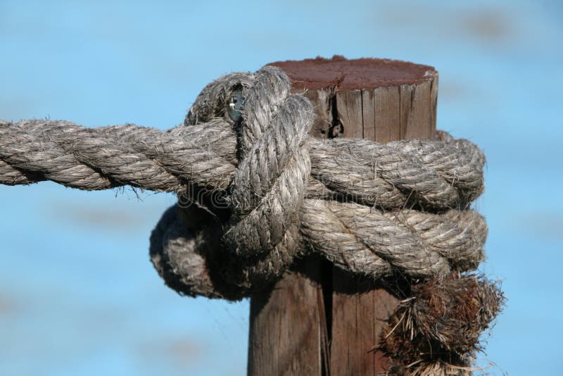 Rope Tied to Post 2 stock image. Image of post, wooden - 229426447