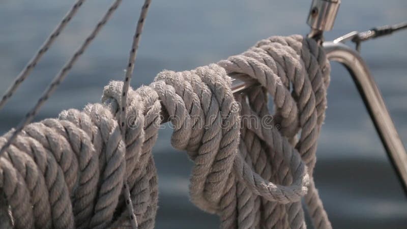 A Rope is Tied in a Knot Around a Fence Post, Rope Tied Hitch Knots on ...