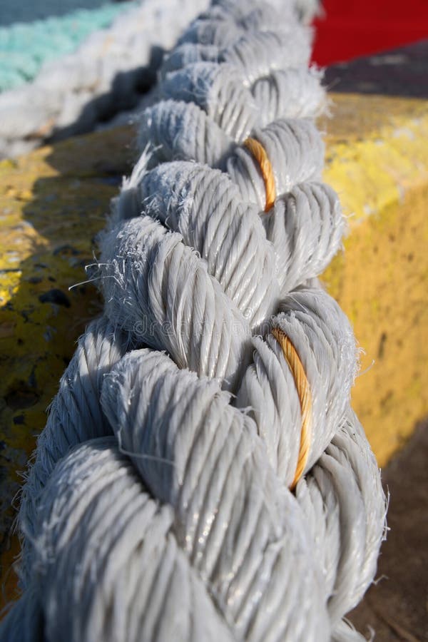 Rope Tied To Stone for Fishing at Harbour Stock Image - Image of ...