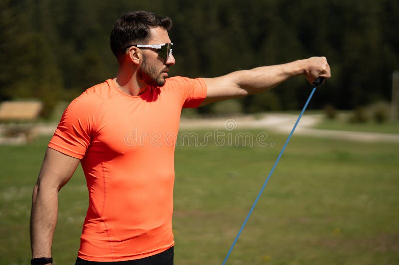 Man Stretching with Rope Outdoors in Nature Stock Photo - Image of ...