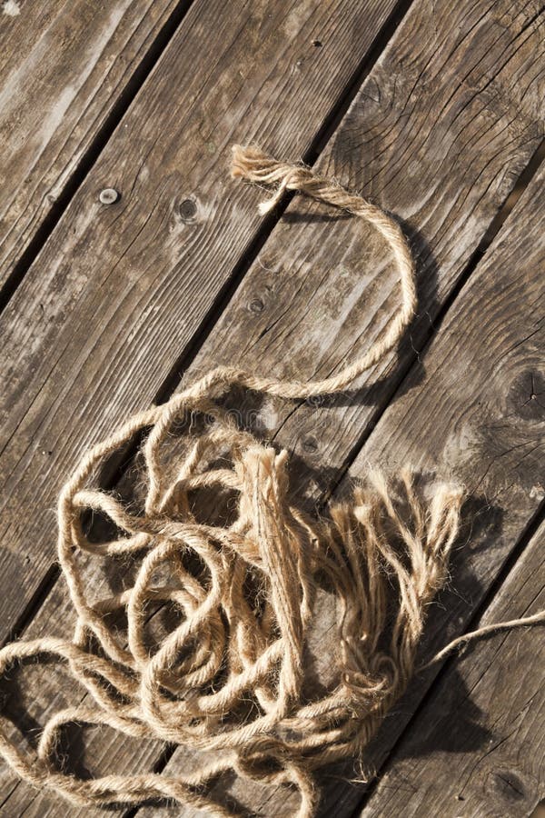 Rope on the wood table stock image. Image of design, wooden - 45569677