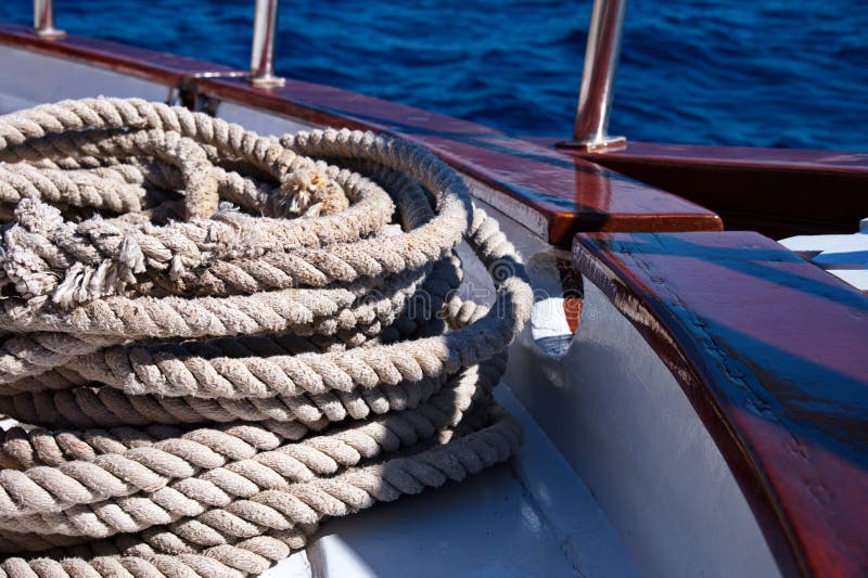 Rope on Wooden Deck of a Ship Stock Photo - Image of blue, rope: 257415638
