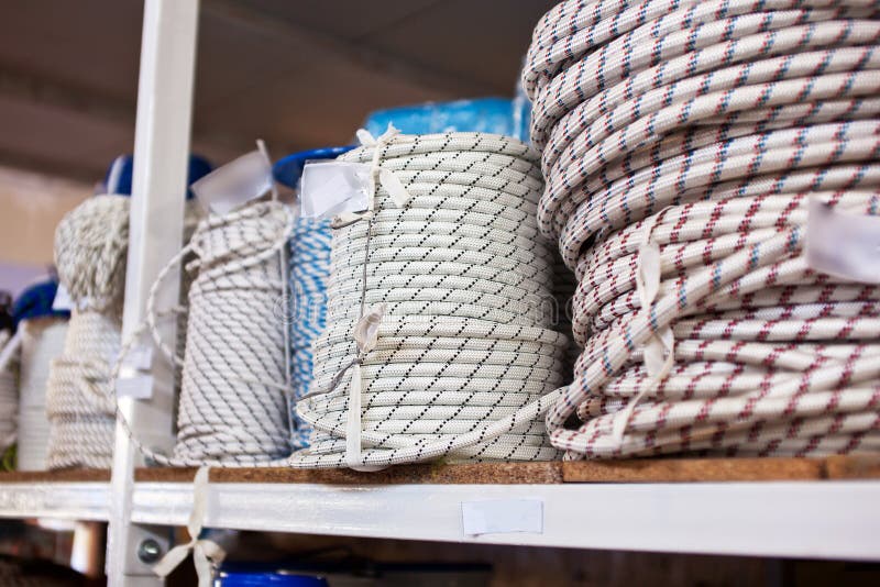 The rope wound on a pin stock photo. Image of store, string - 94437842