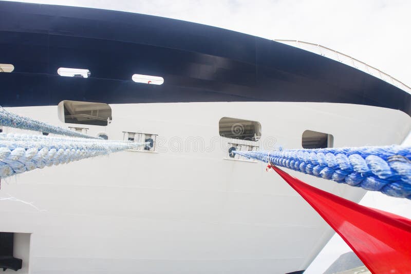 Ropes and Red Flag on Blue and White Cruise Ship Stock Photo - Image of ...